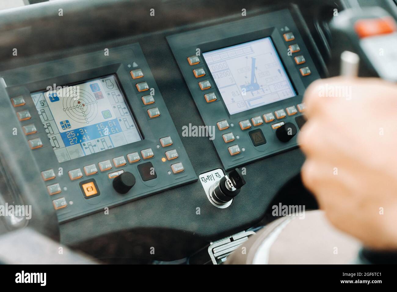 Crane control panel in the driver's cab of a car crane Stock Photo - Alamy