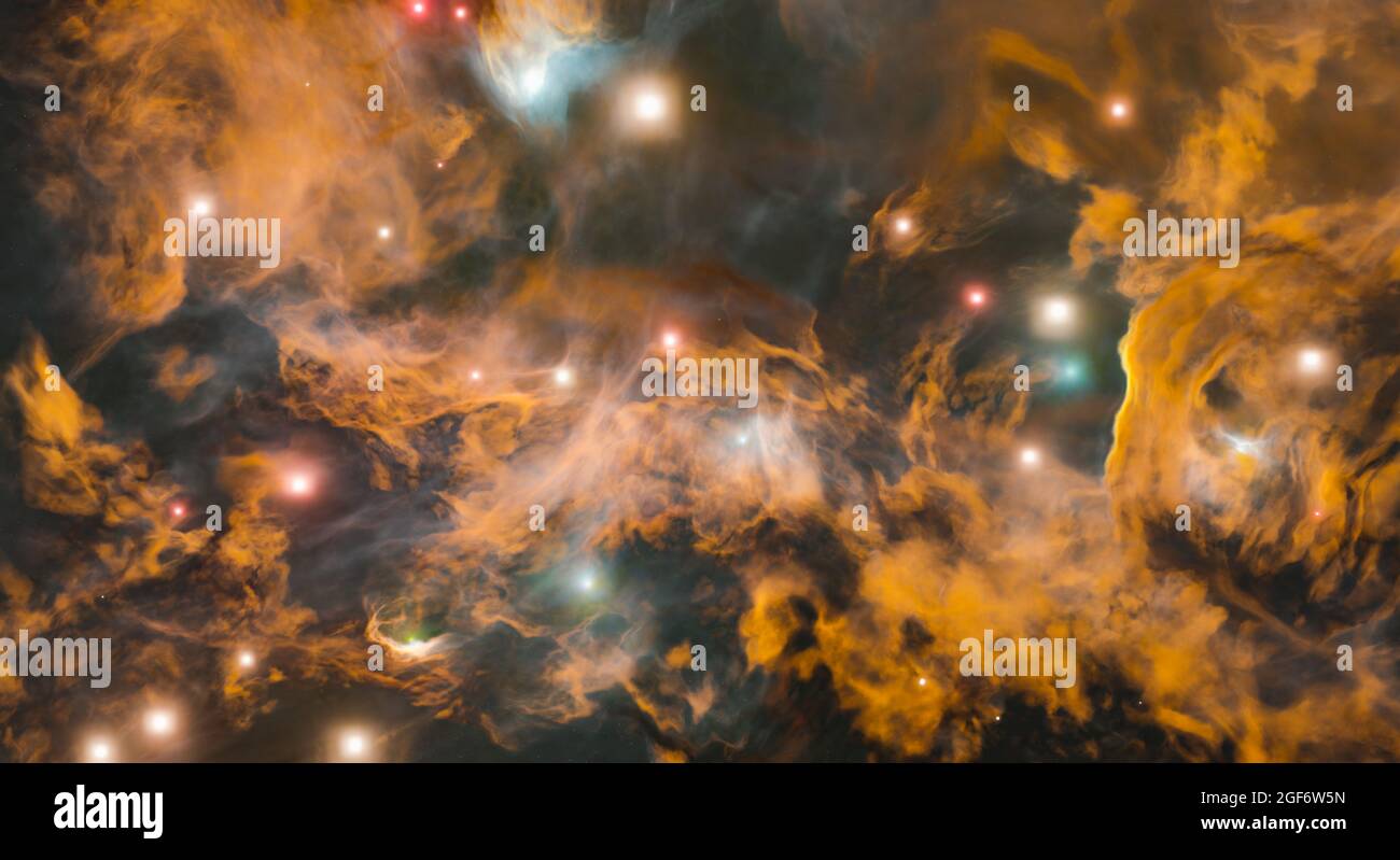 golden nebula background with bright stars and gas clouds. concept of ...
