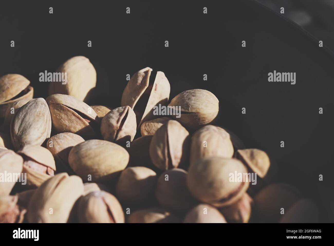 Organic pistachios in the sun, healthy food and snack background Stock ...