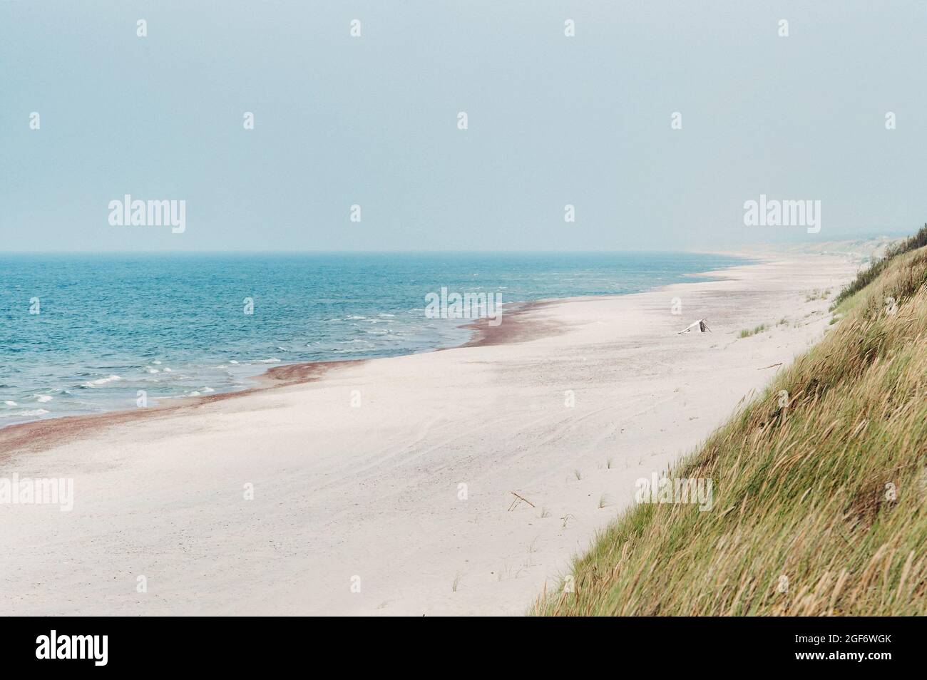 Sandy beach and a blue sea. Baltic sea, Nida, Lithuania Stock Photo - Alamy