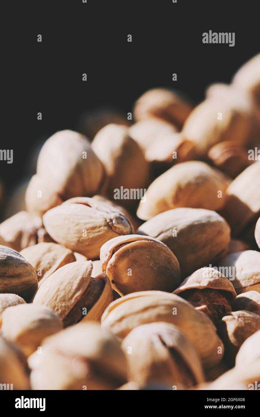 Organic pistachios in the sun, healthy food and snack background Stock ...