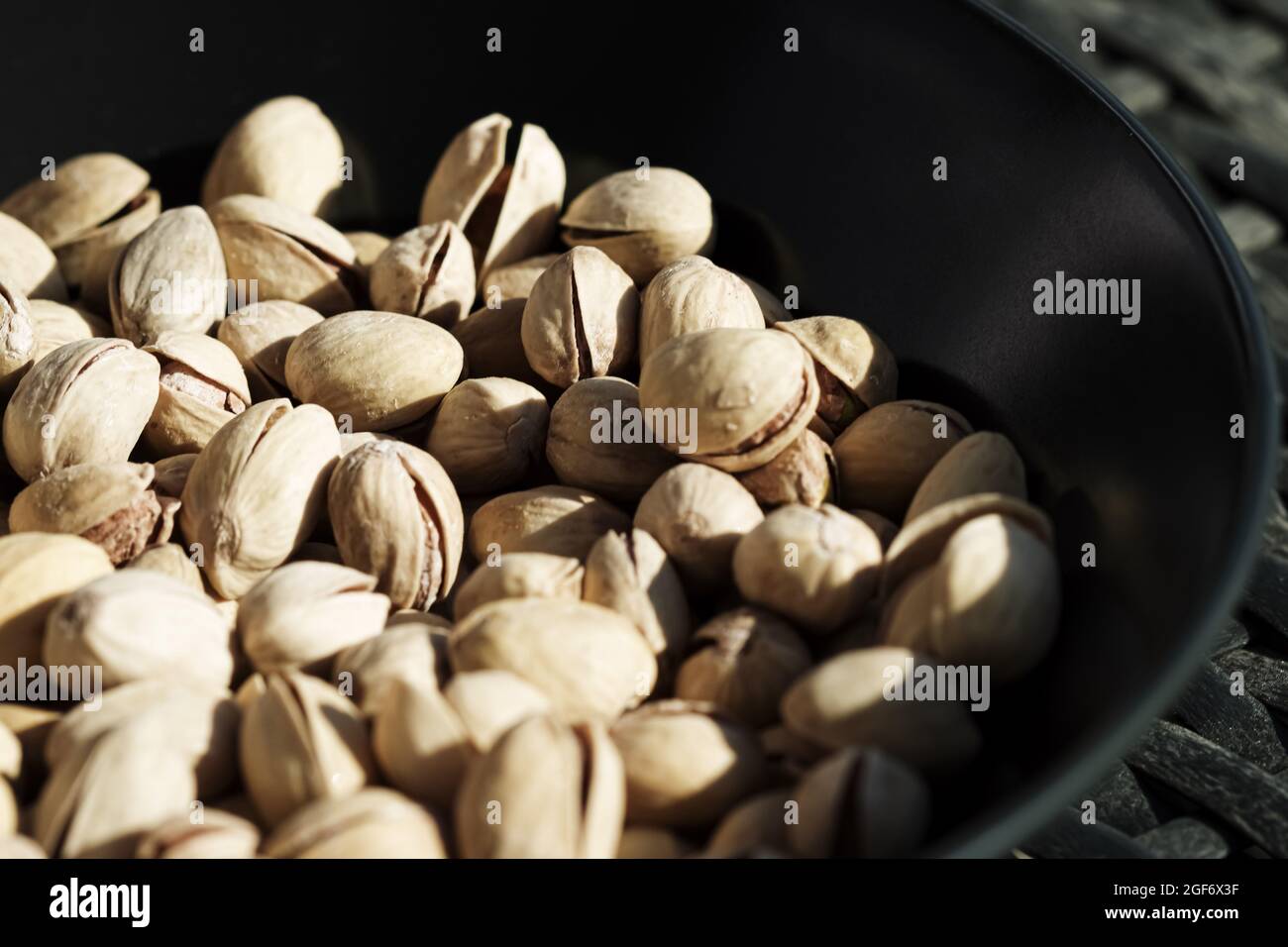 Organic pistachios in the sun, healthy food and snack background Stock ...