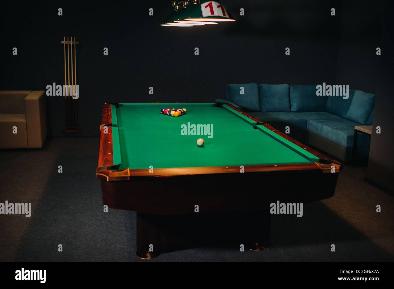Billiard table with green surface and balls in the billiard club.Pool ...