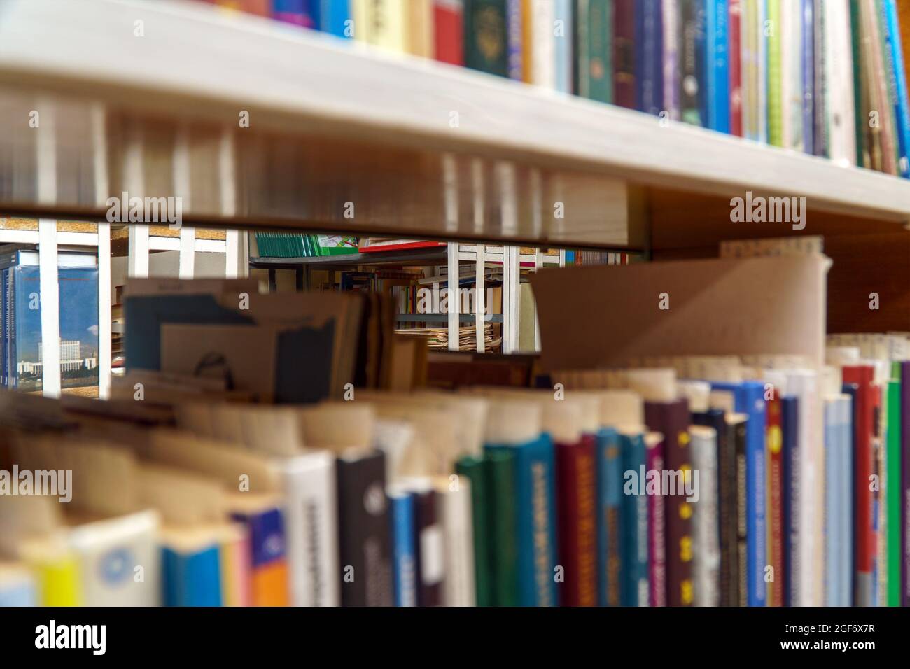 Books on a shelf in the library. Selective focus Stock Photo - Alamy