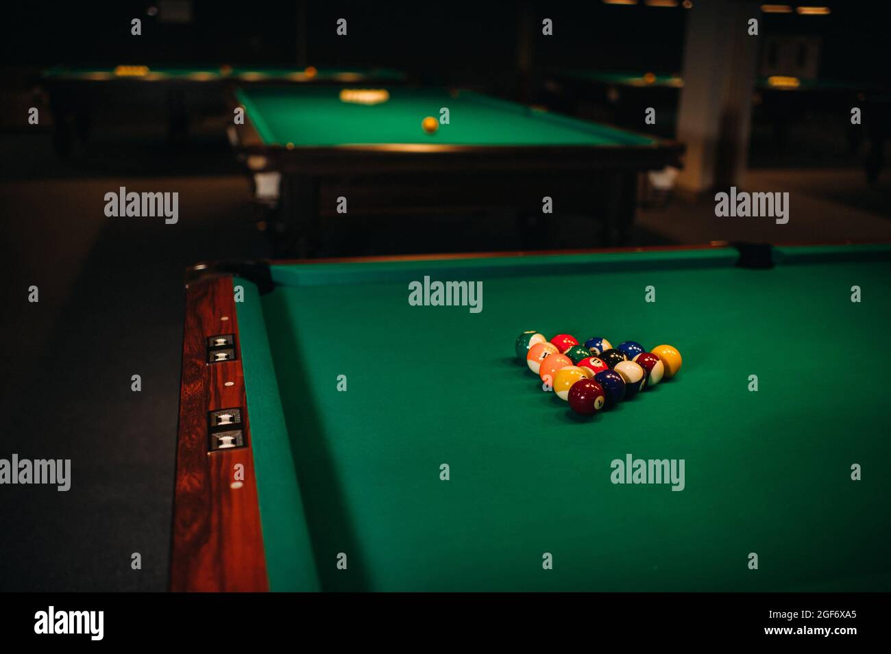 Billiard table with green surface and balls in the billiard club.Pool ...