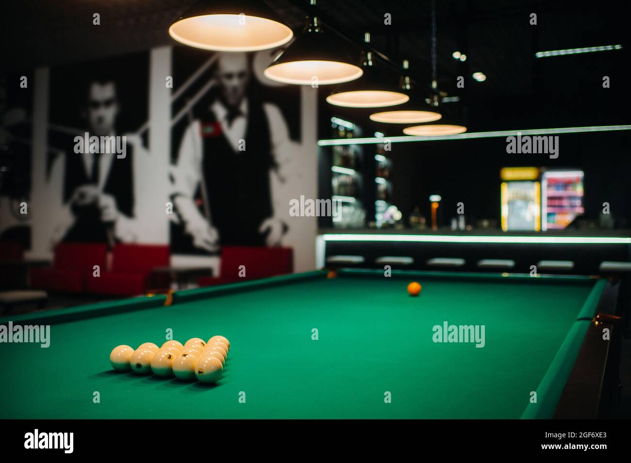 Billiard table with green surface and balls in the billiard club Stock ...