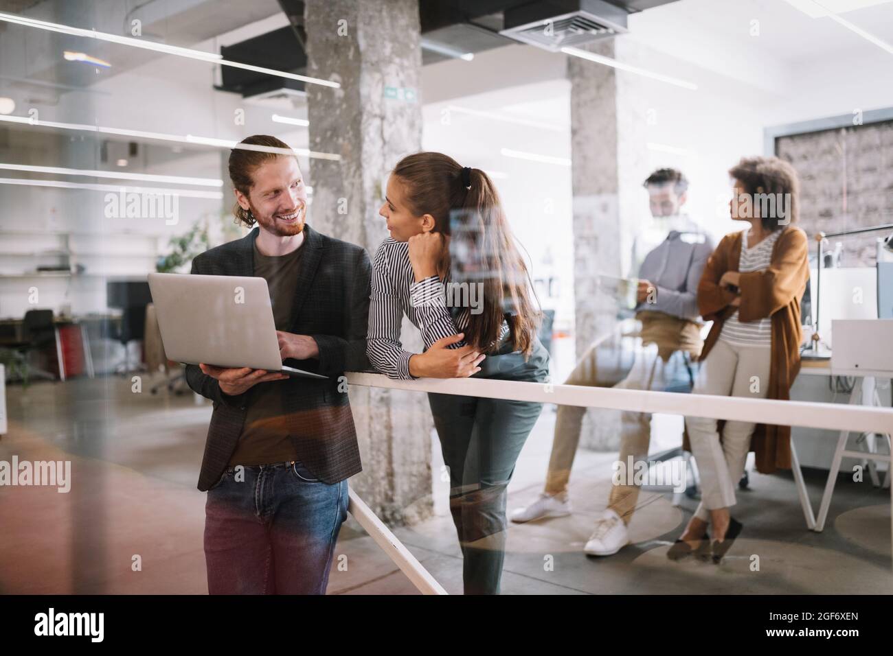 Business people having fun and chatting at workplace office Stock Photo ...