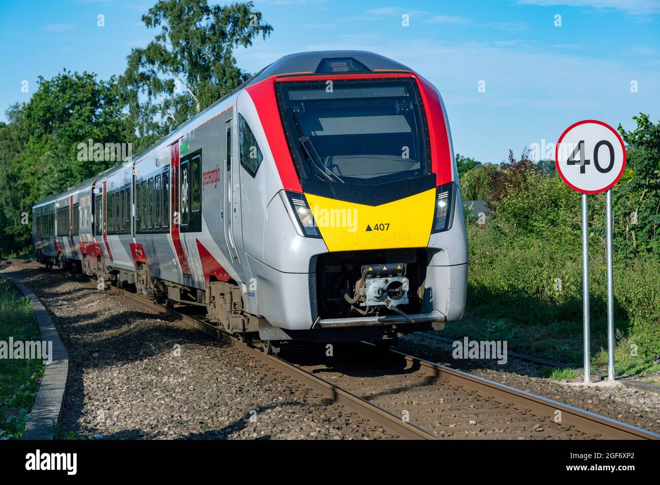 Stadler bi-mode passenger train approaching Woodbridge on the East ...