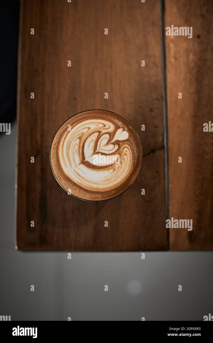 Selective focus cup of hot latte art coffee,focus at white foam Stock ...