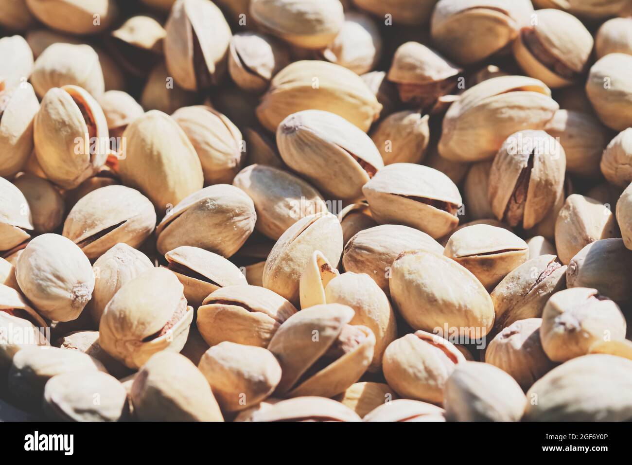 Organic pistachios in the sun, healthy food and snack background Stock ...