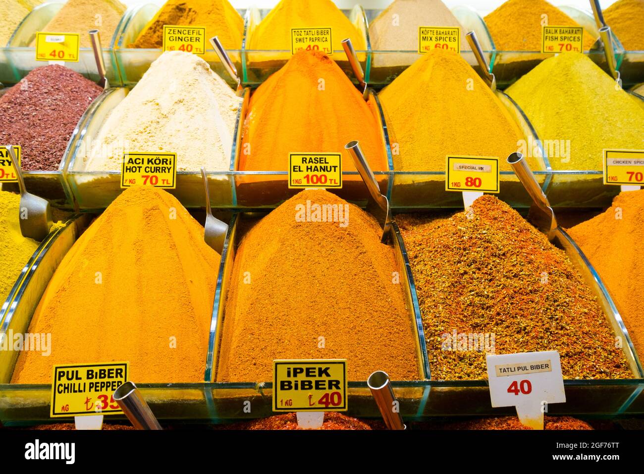 The beautiful pyramid piles of exotic spices in a stall, shop at the ...