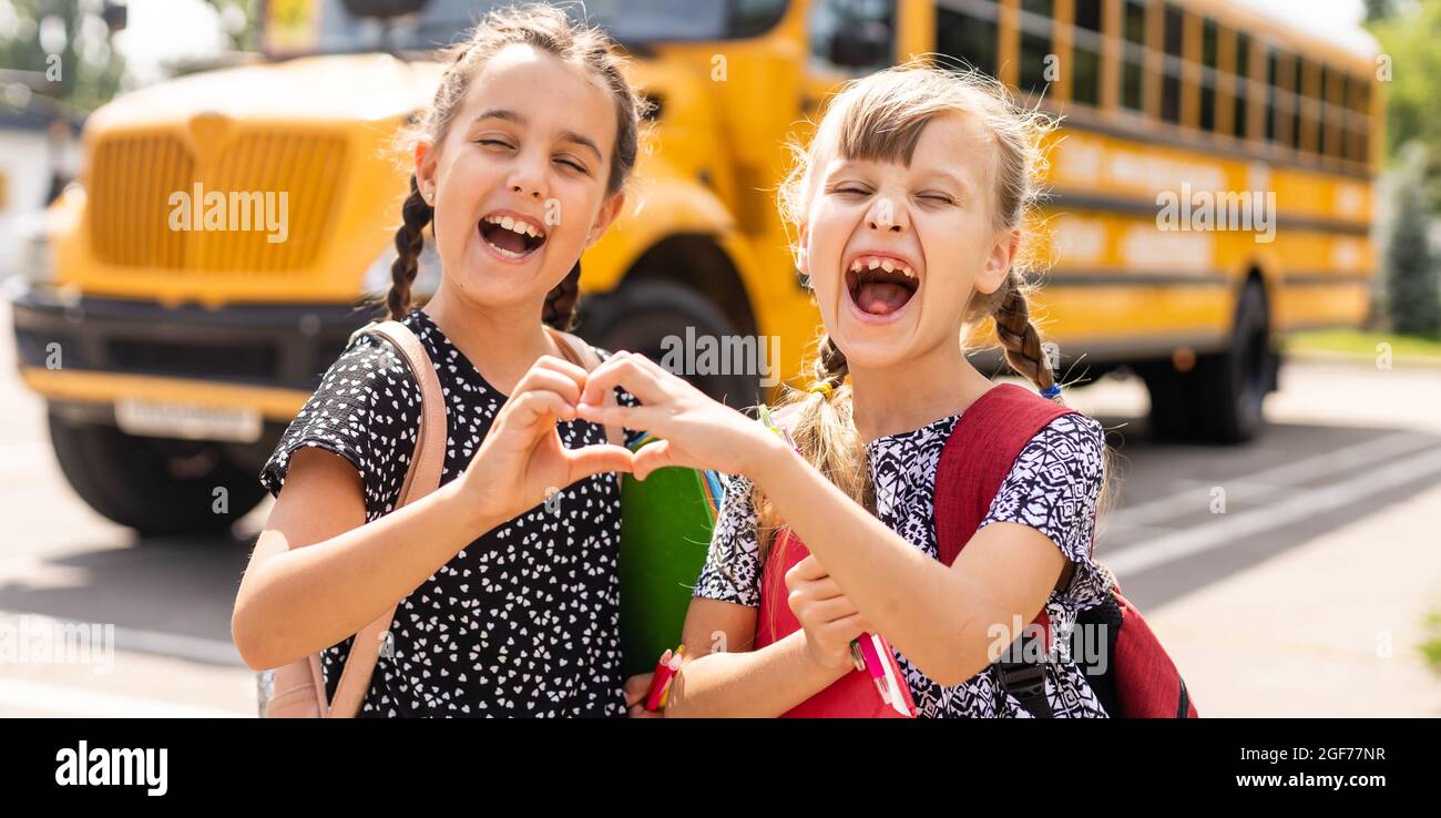 Happy Schoolgirls outdoor. Back to School Stock Photo - Alamy