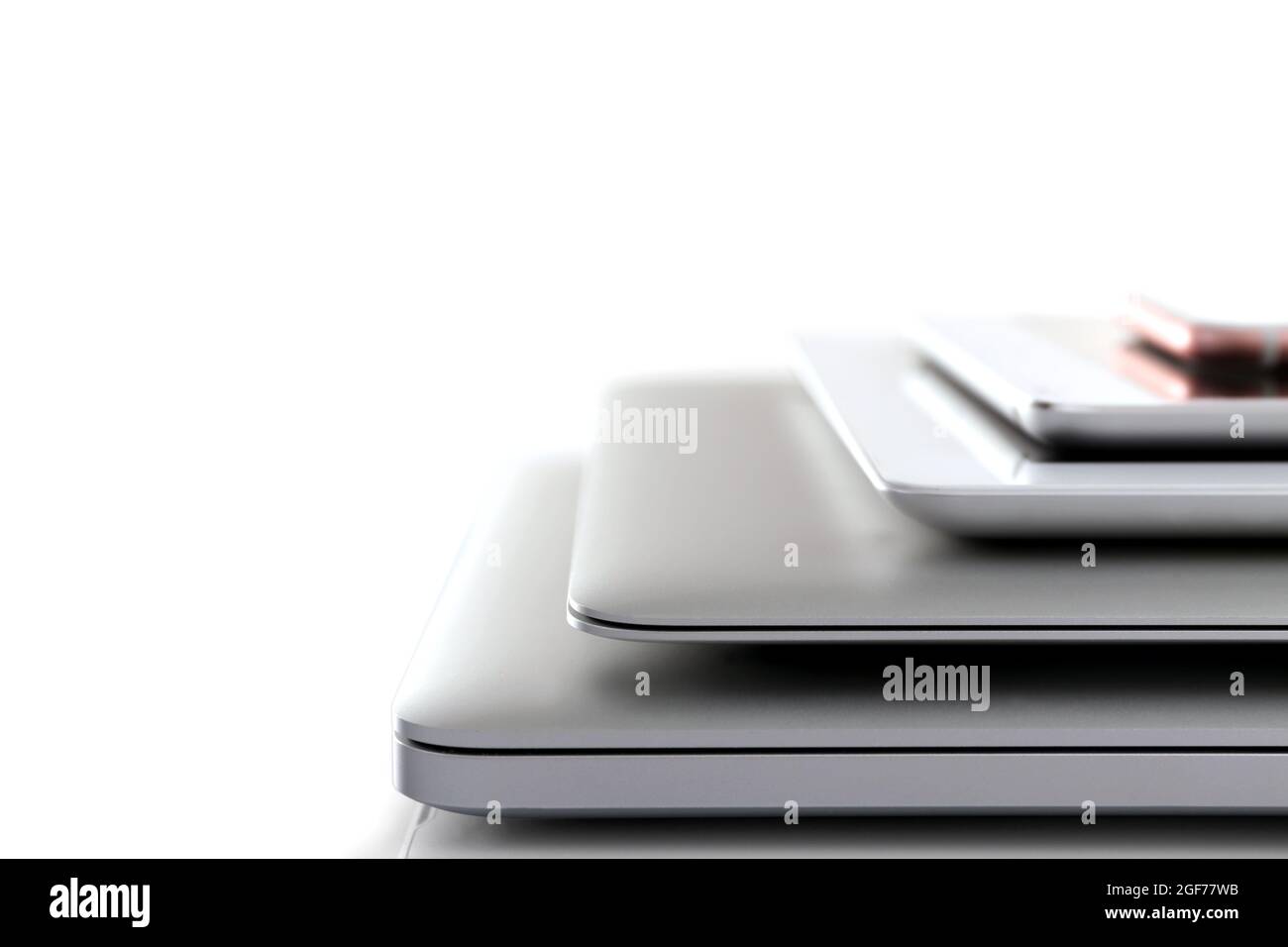 Stack of electronic devices isolated on a white background Stock Photo ...
