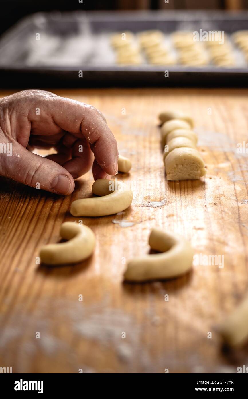 Old woman baking cookies hi-res stock photography and images - Alamy