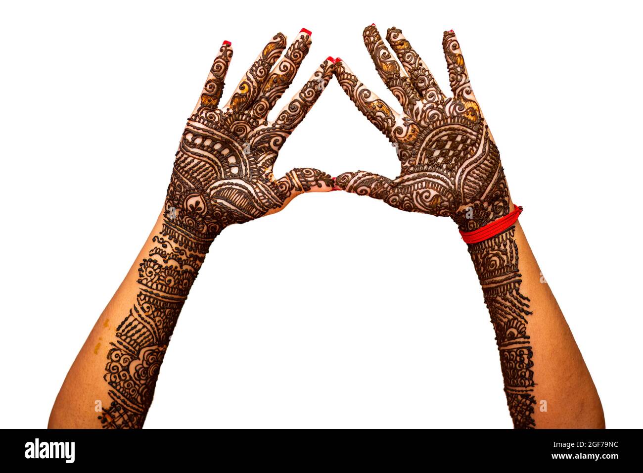 Indian Bride's hand painted with mehndi isolated on white background ...
