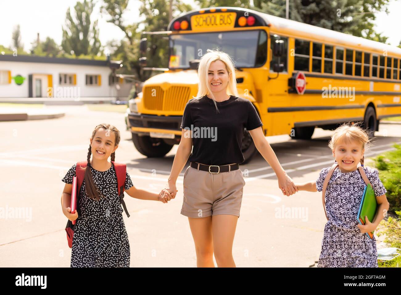 mother welcome home of daughters back from school in the first day ...
