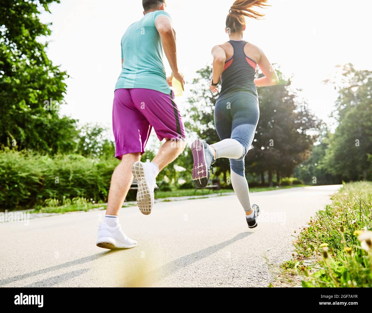 fitness woman park exercise lifestyle outdoor sport healthy couple ...
