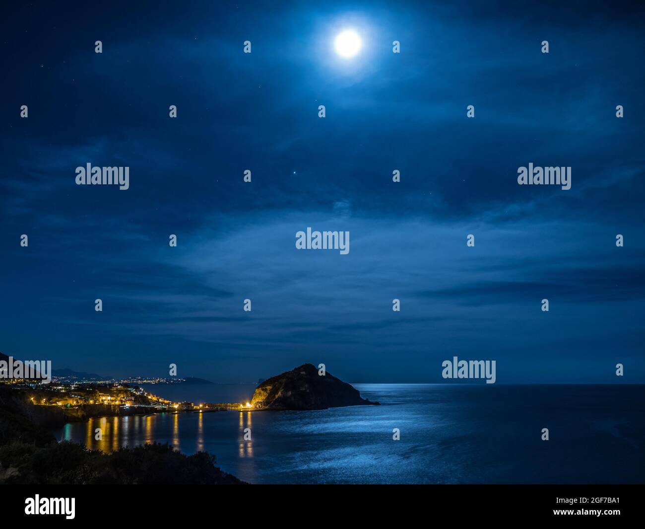 View of Sant'Angelo, night shot under full moon, Ischia, Calabria ...