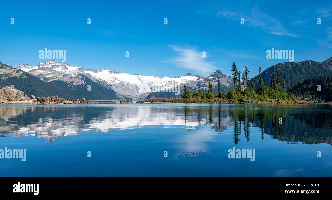 Garibaldi Lake, mountains reflected in turquoise glacial lake, Guard ...