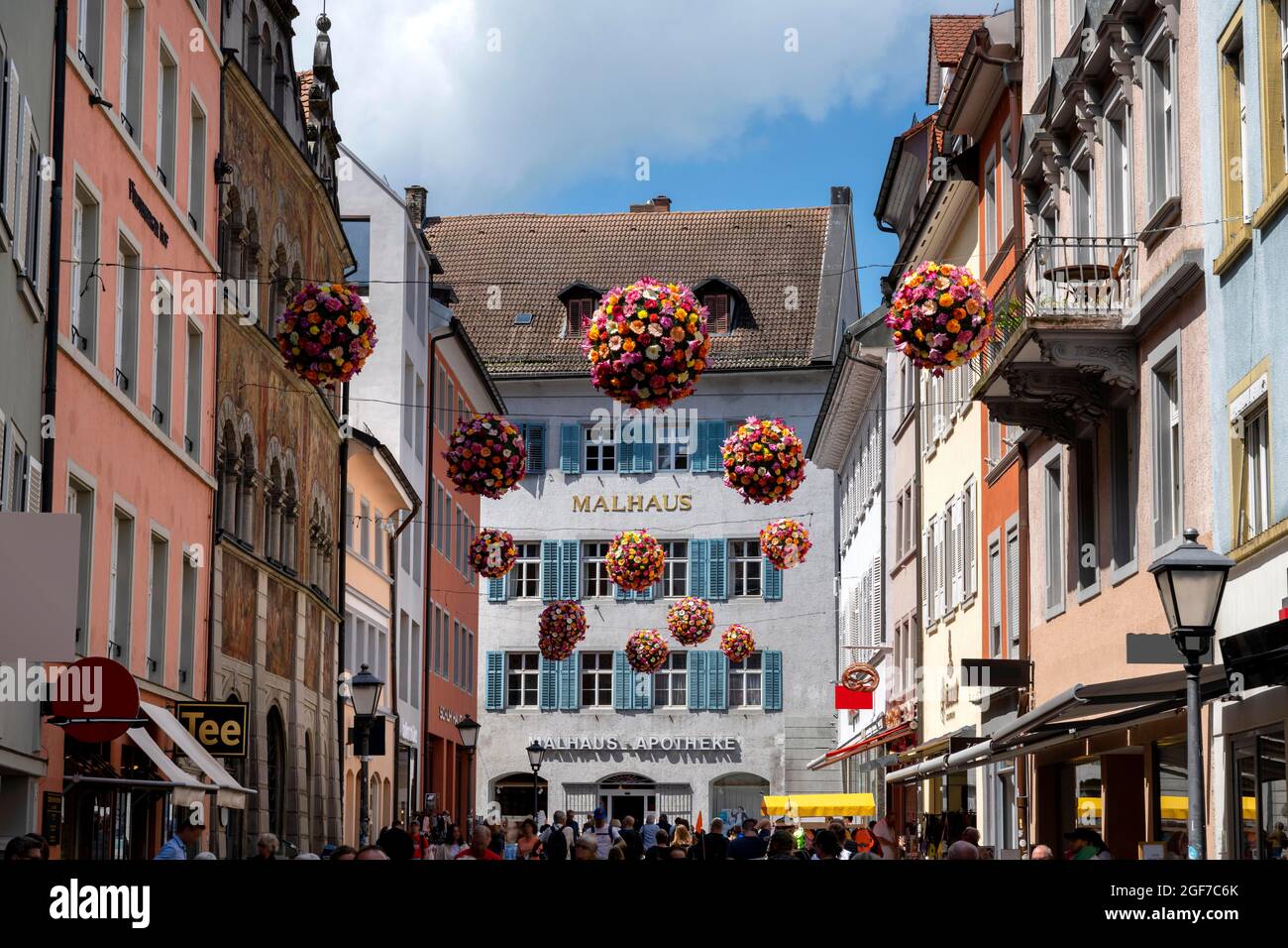 Pedestrian zone in the old town of Constance with flower decorations ...