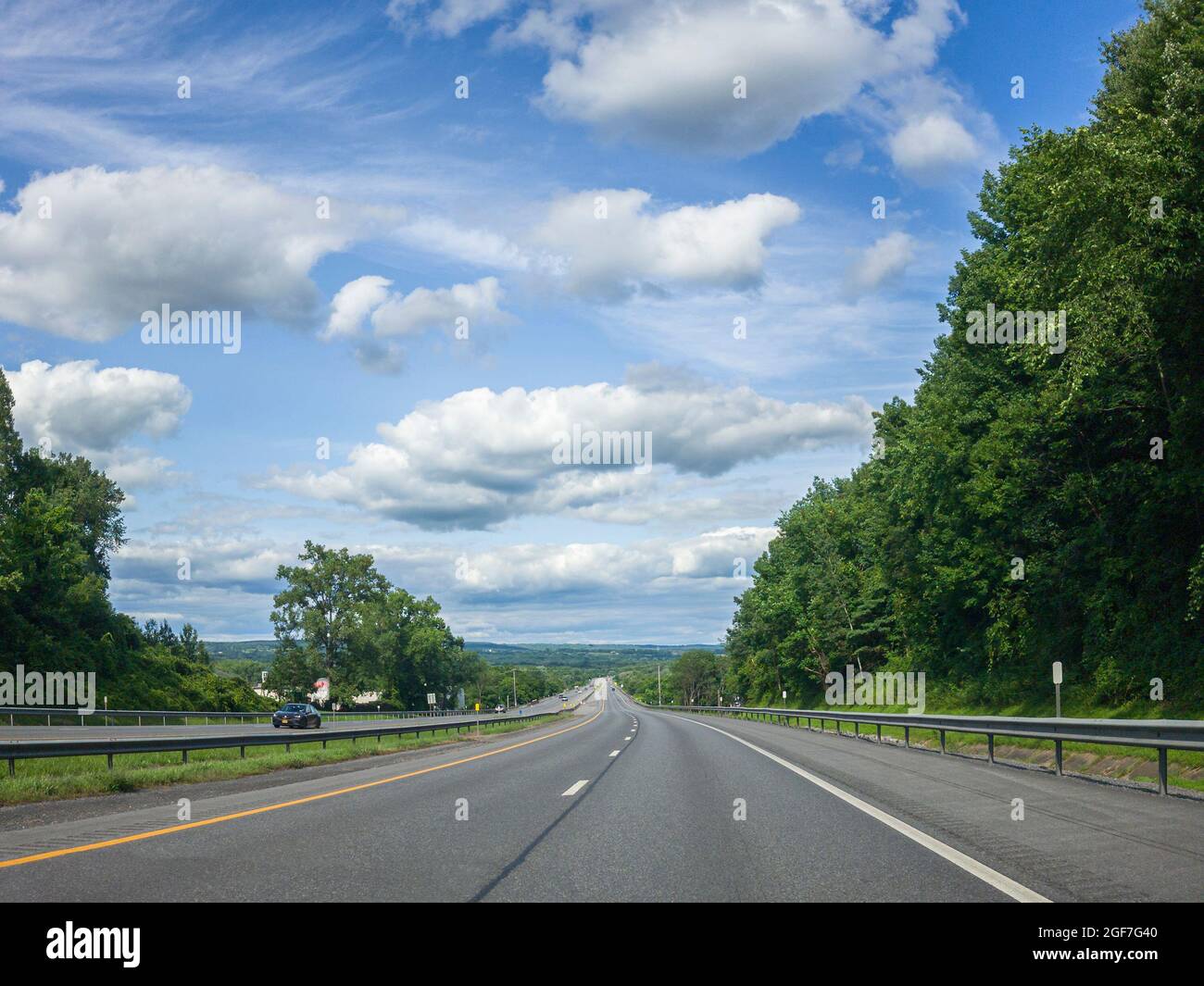 Classic Summer US Freeway View Going Downhill on a Cloudy Day in ...