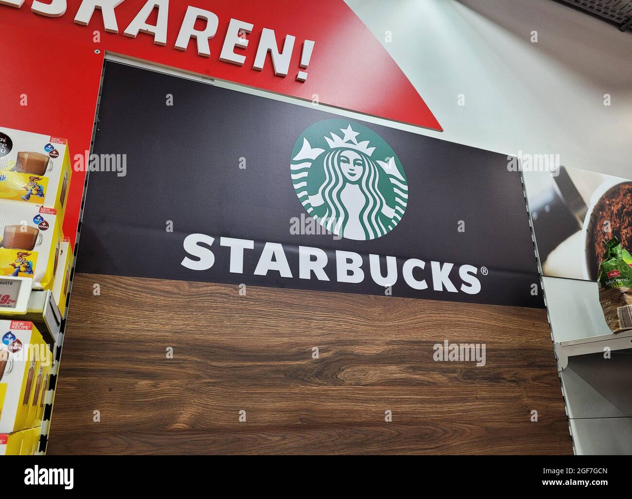 Starbucks signs in a store Stock Photo - Alamy