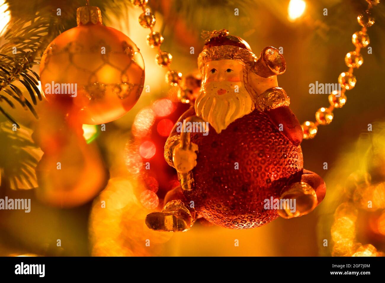 Father Christmas Deco Hanging on the Christmas Tree Stock Photo - Alamy