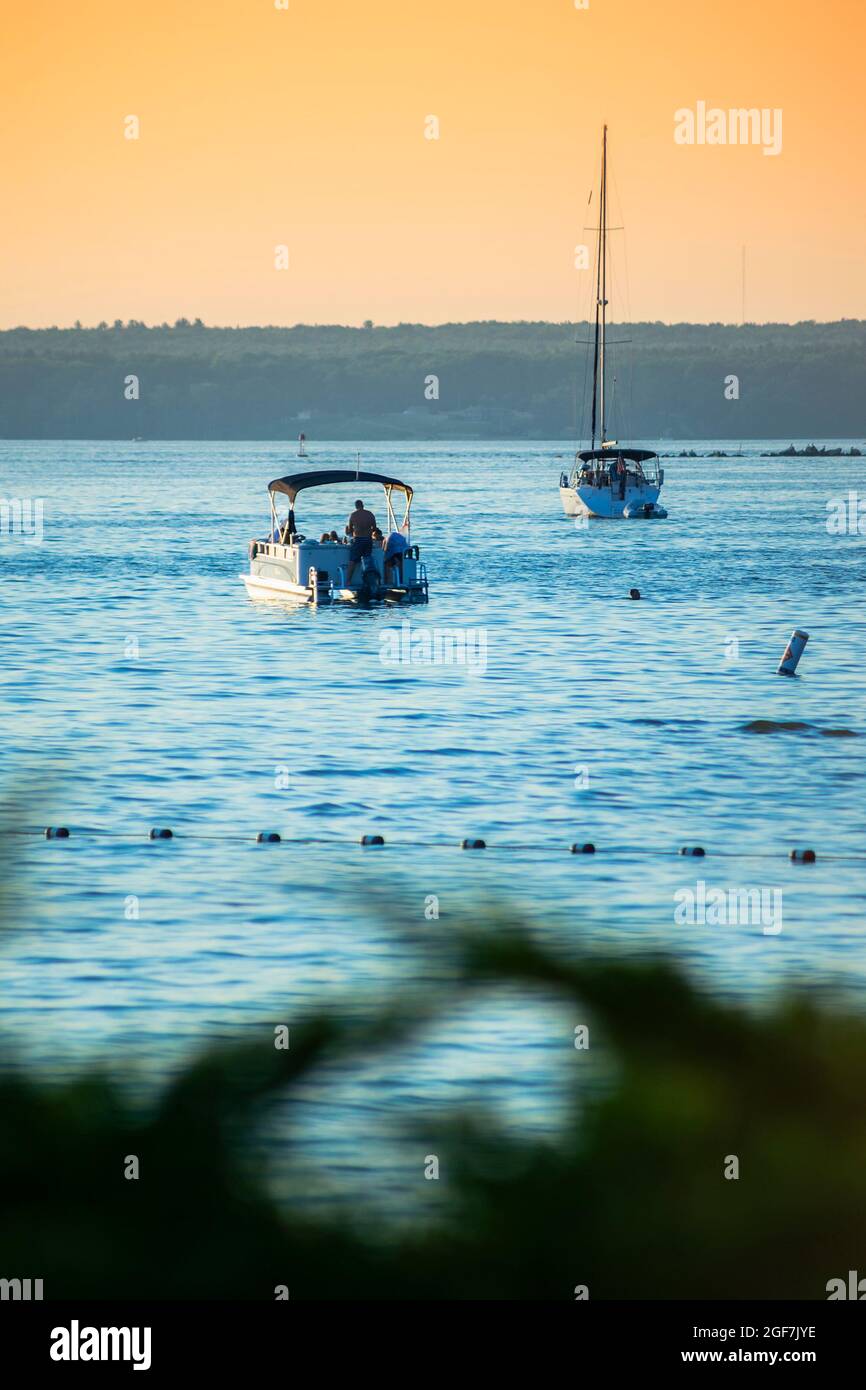 Long View of Boats Sailing in Oneida Lake at Sunset in Upstate New York ...