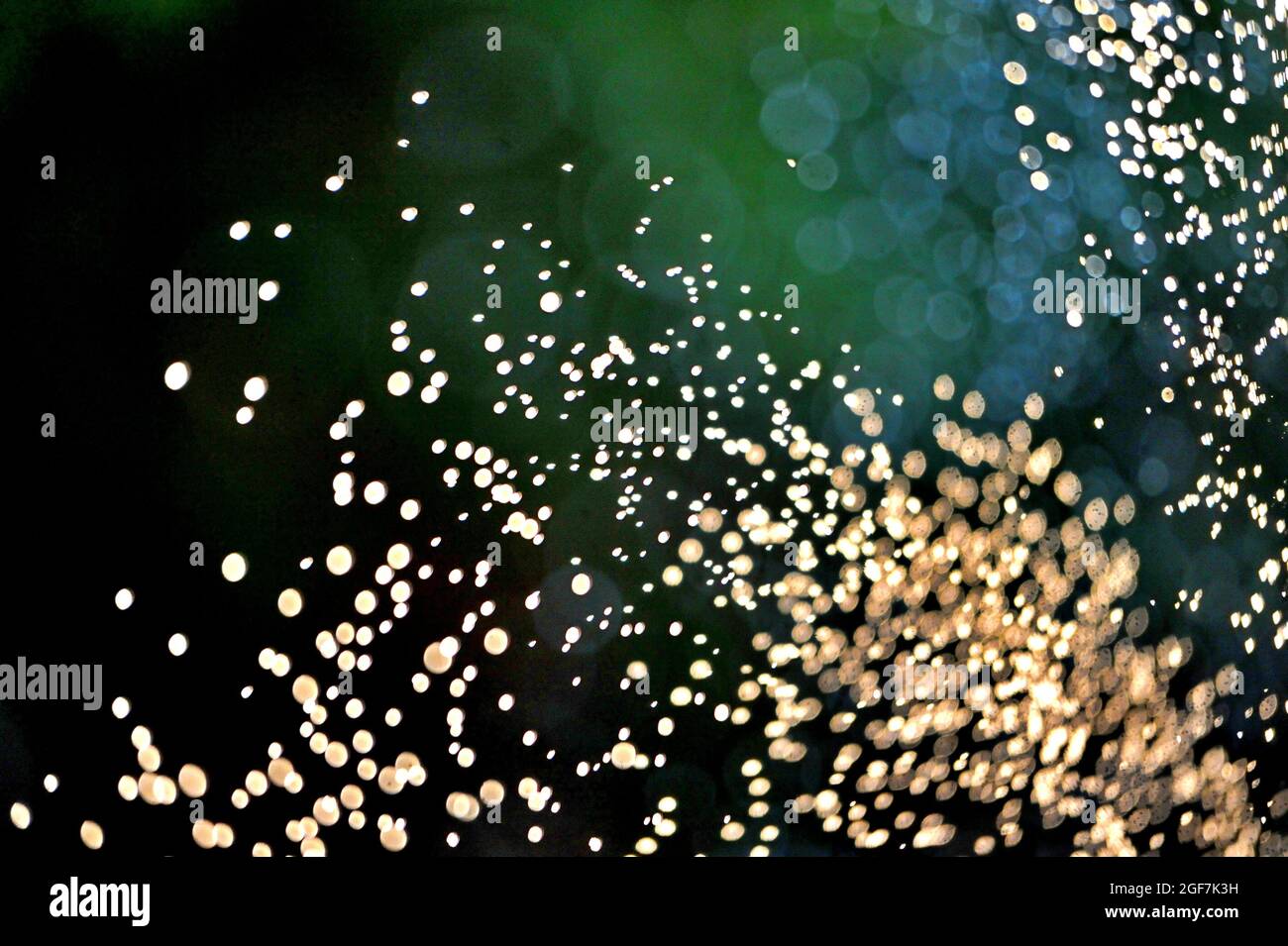 Water drops flying in one direction, waterdrops levitating on blur ...