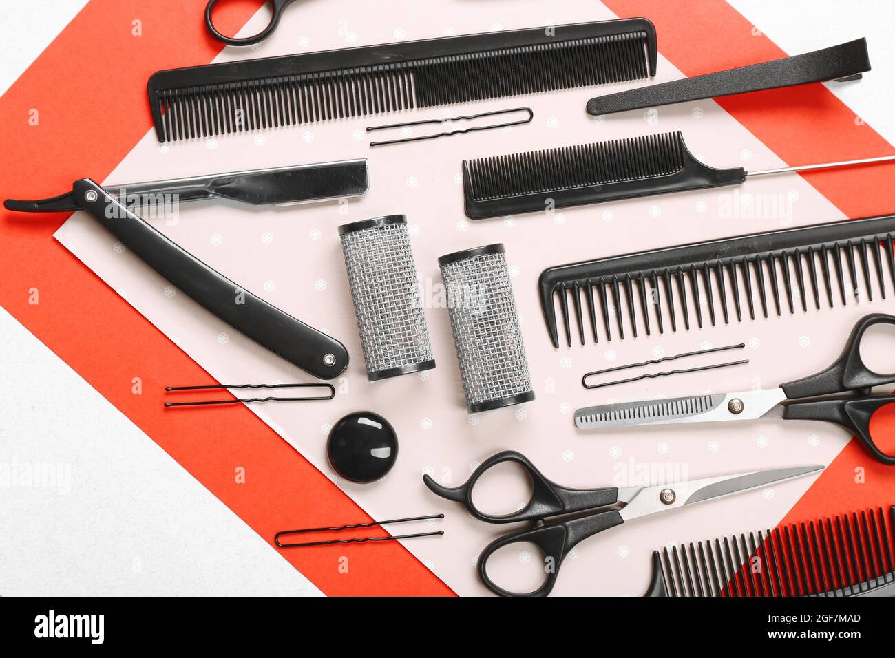 Barber set with tools on bright paper background Stock Photo - Alamy