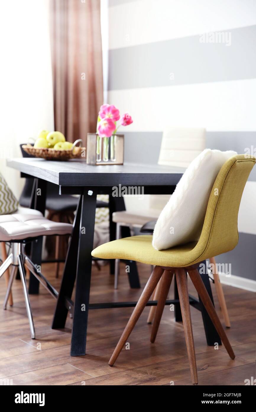Modern room interior with table and chairs Stock Photo - Alamy