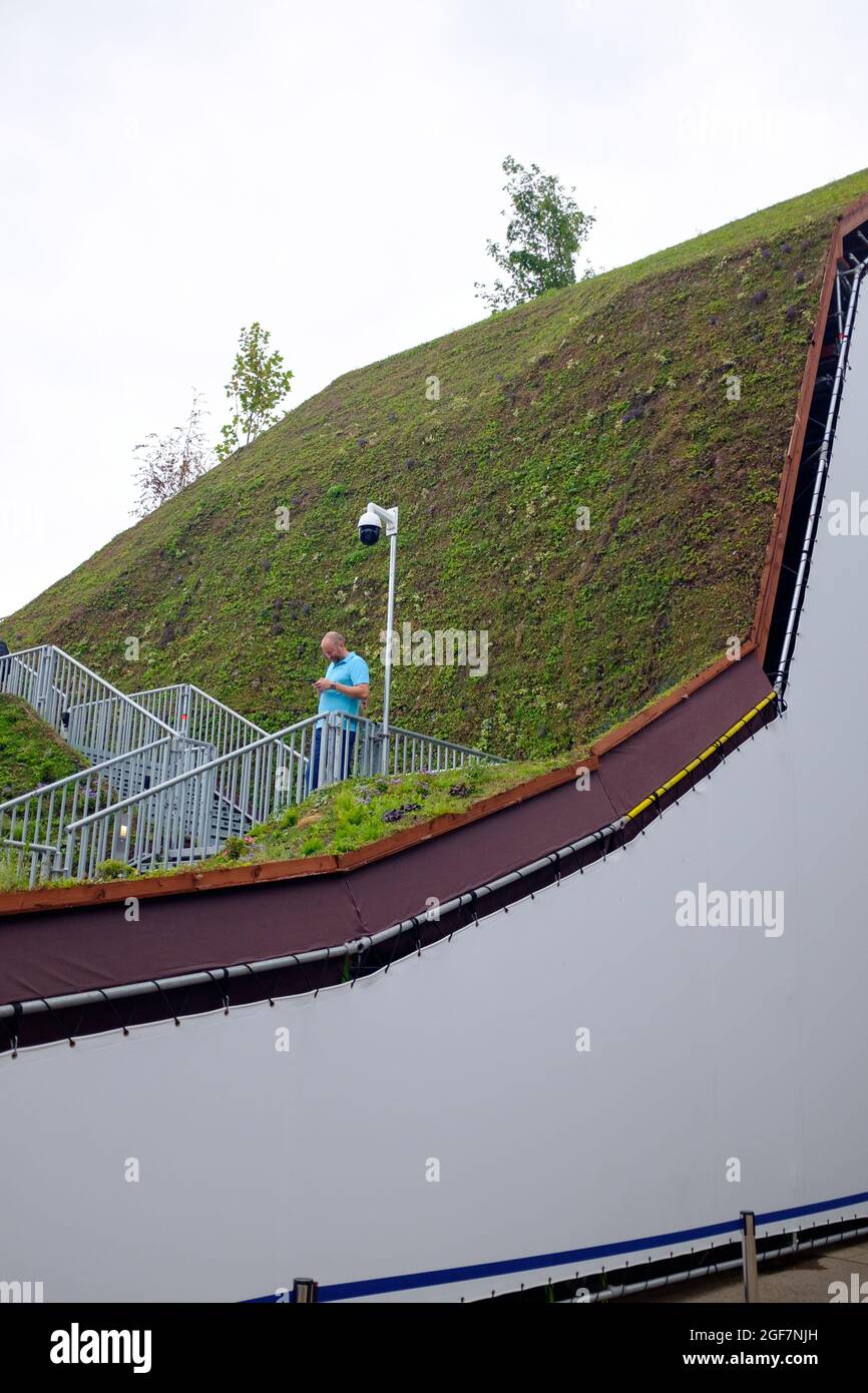 Marble Arch Mound - ground-level view of members of the public climbing ...