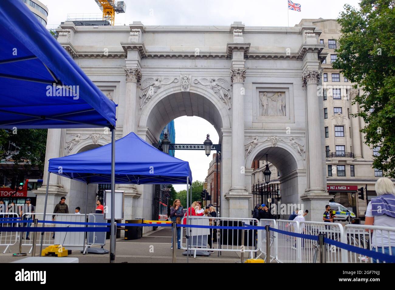 Marble Arch Mound - ground-level view of members of the public climbing ...