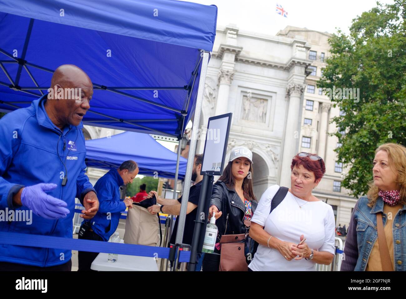 Marble Arch Mound - ground-level view of members of the public climbing ...