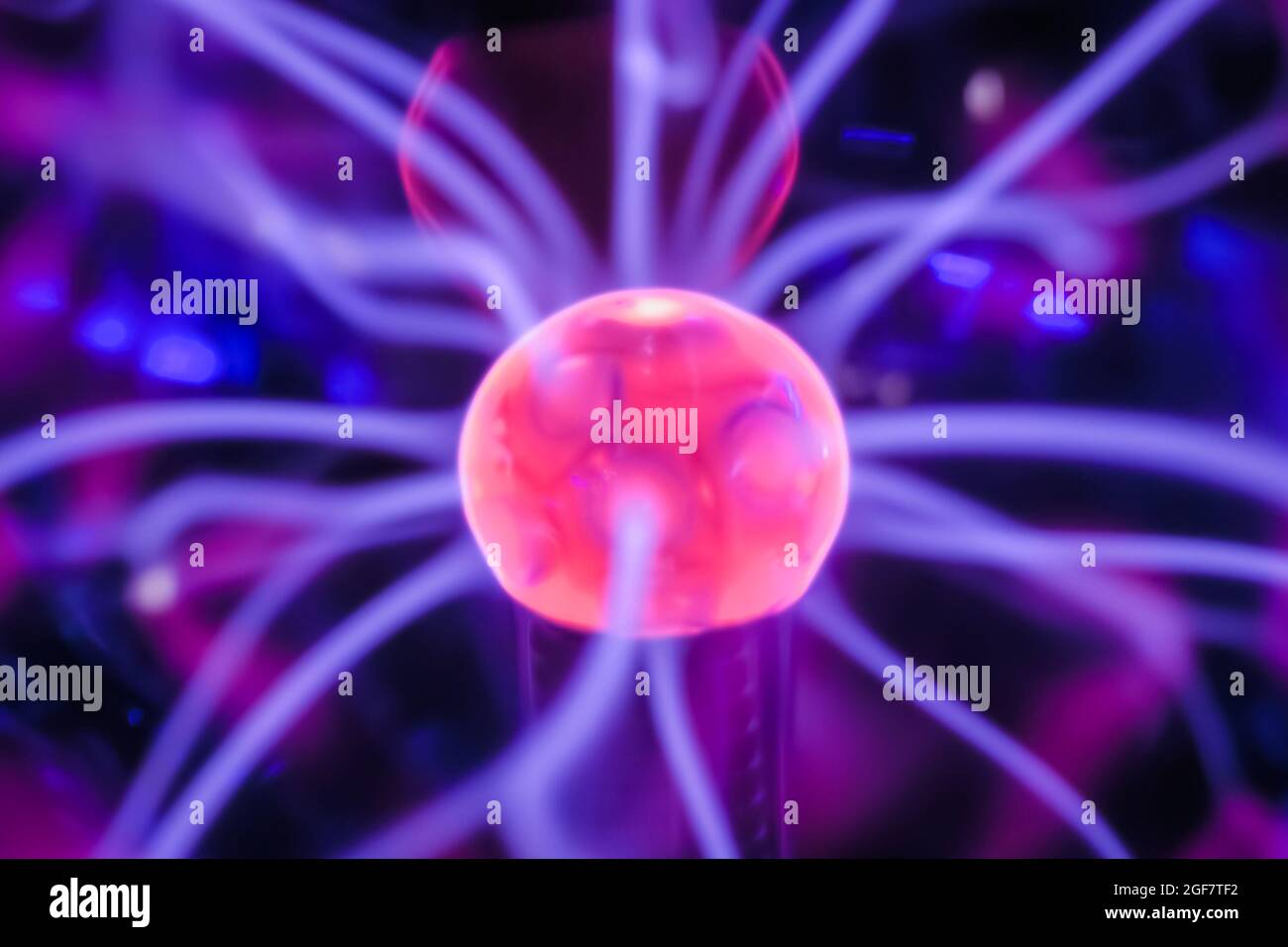 Plasma ball with many energy rays inside - close up Stock Photo - Alamy