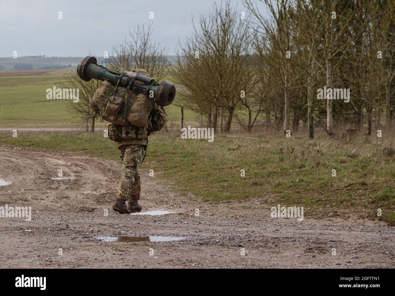 British army soldier completing an 8 mile combat fitness test tabbing ...