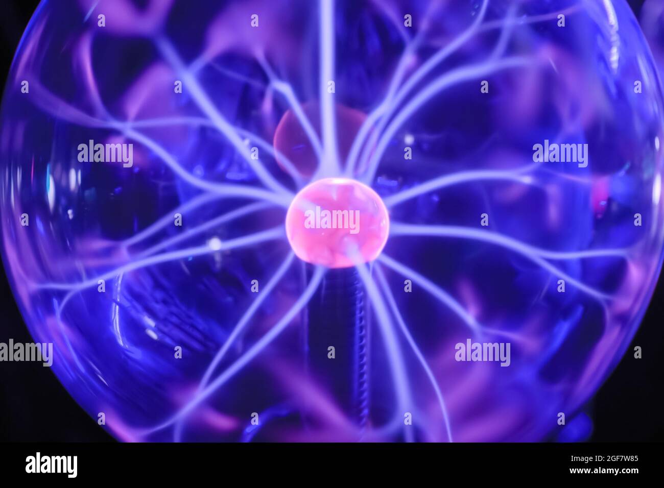 Plasma ball with many energy rays inside - close up Stock Photo - Alamy