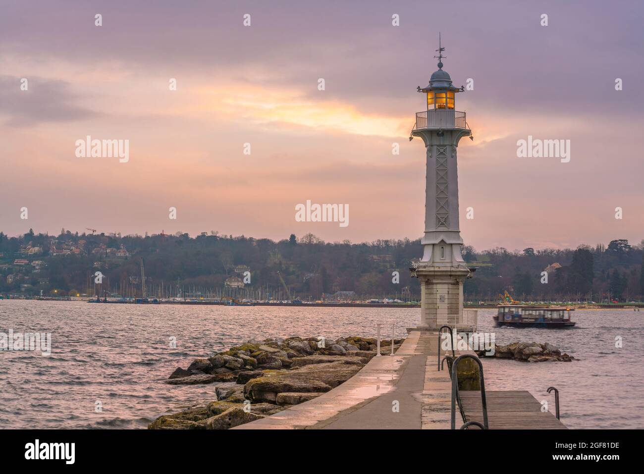 Lighthouse in Lake Geneva at sunrise in Switzerland Stock Photo - Alamy