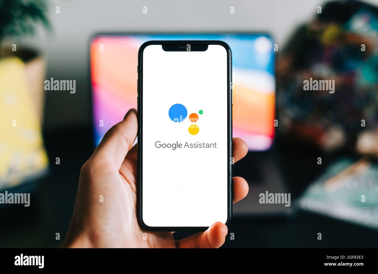 Google assistant app on the iPhone screen Stock Photo - Alamy