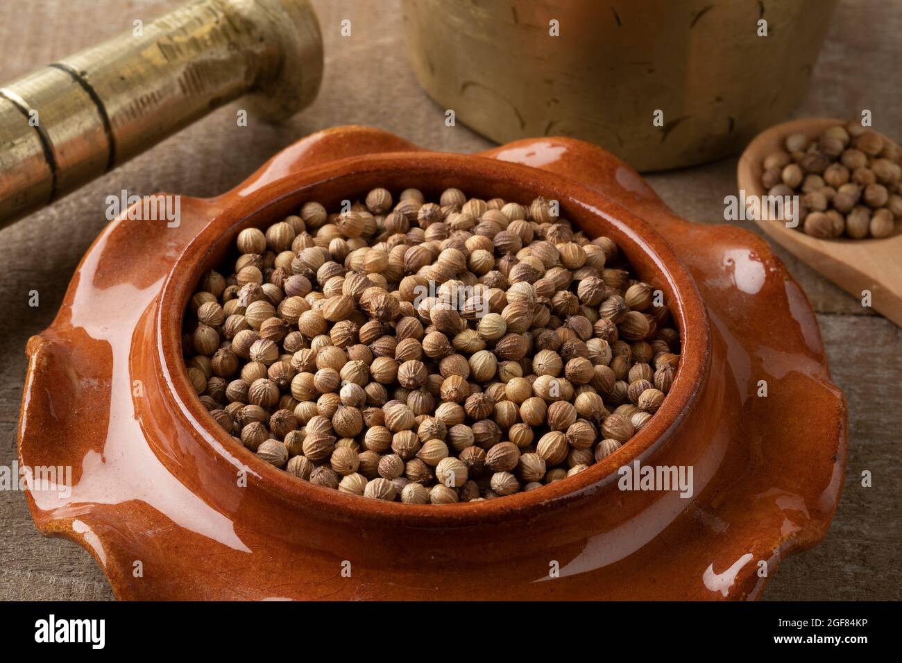 Traditional bowl with dried coriander seed close up Stock Photo - Alamy