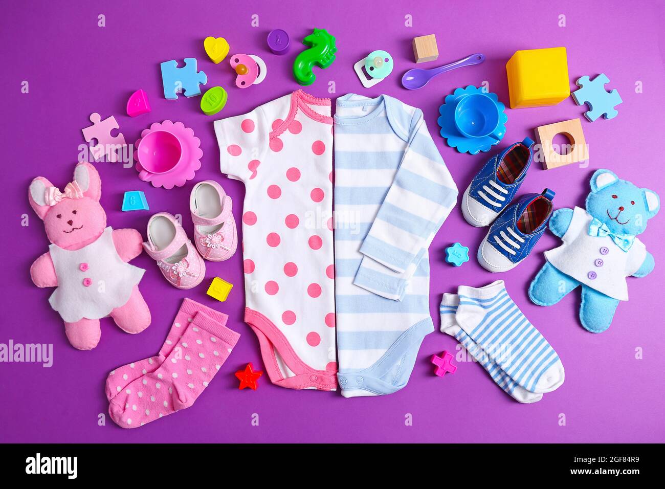 Kids setting on purple background Stock Photo - Alamy