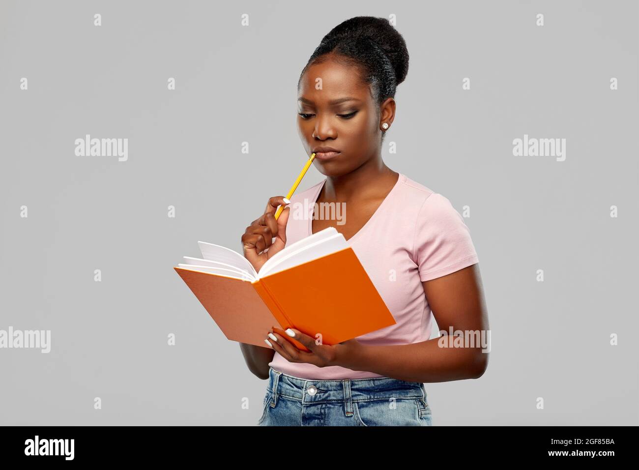 African american student notebook hi-res stock photography and images ...