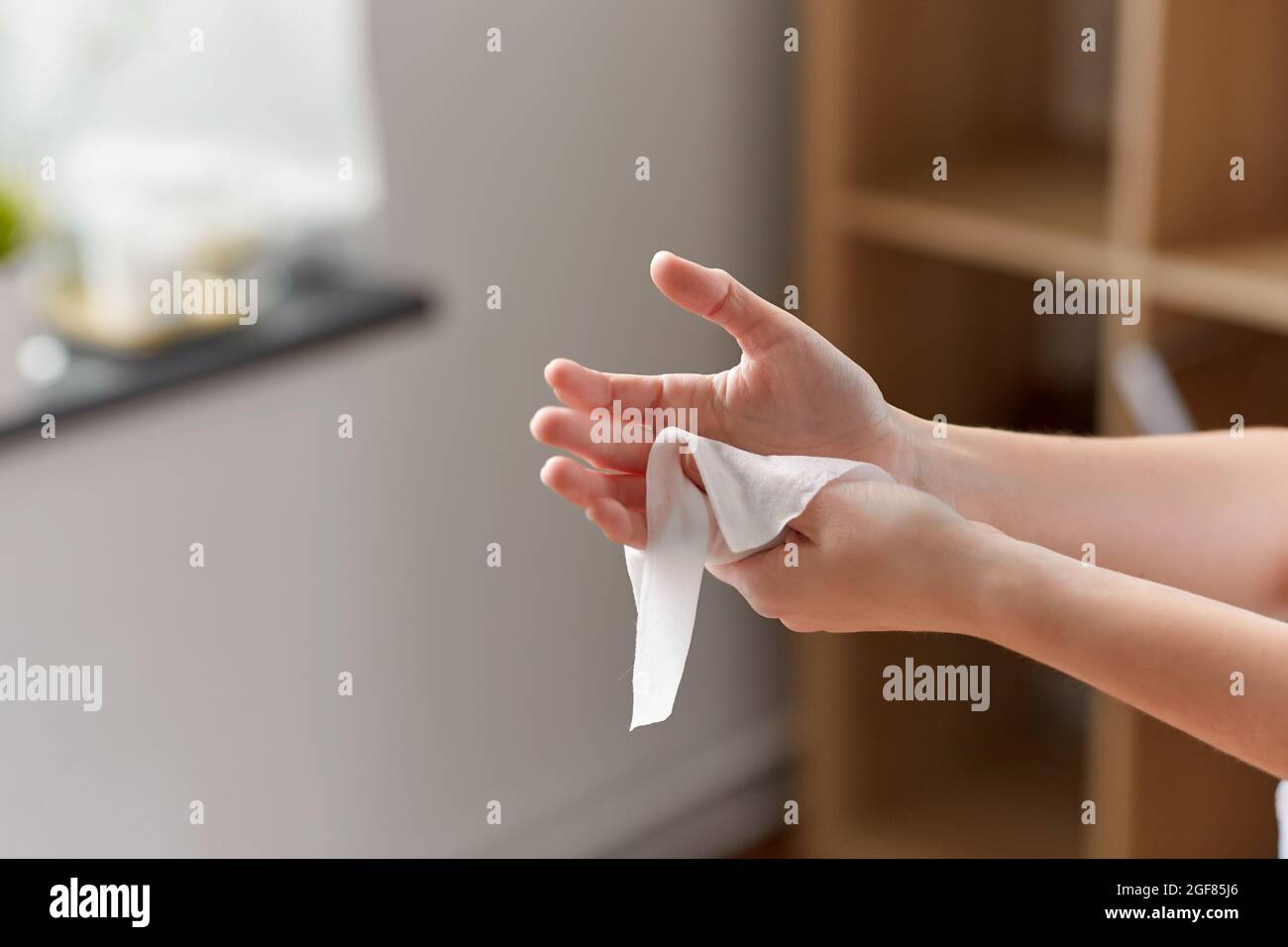 woman cleaning hands with antiseptic wet wipe Stock Photo - Alamy