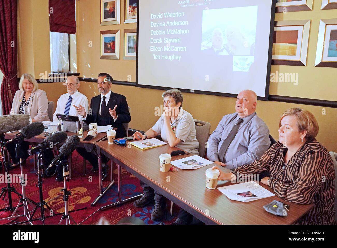 Solicitor Aamer Anwar (third left) and members of the Scottish branch ...
