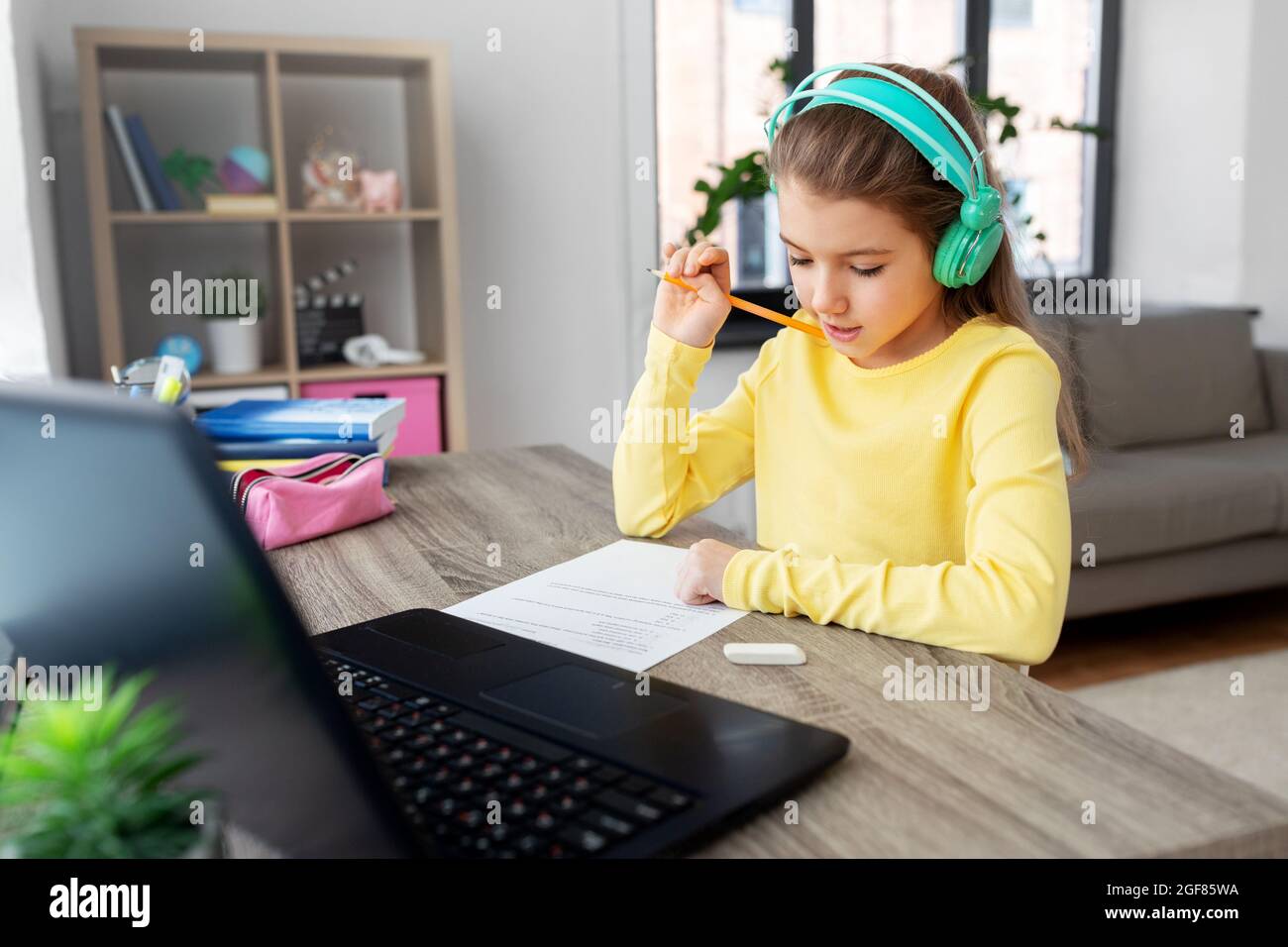 student girl doing school test at home Stock Photo - Alamy