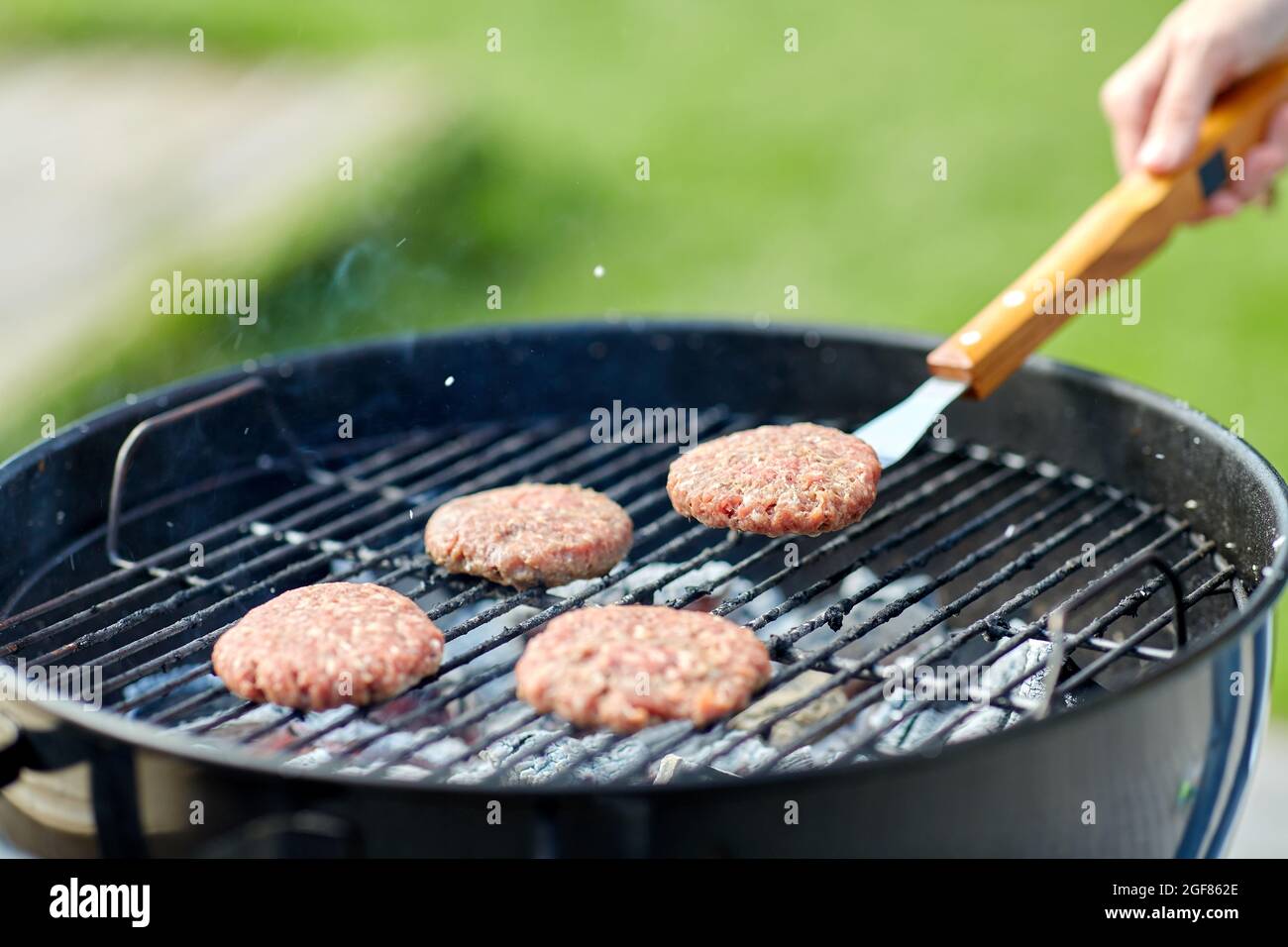 Hand grilling meat barbeque barbeque hi-res stock photography and ...
