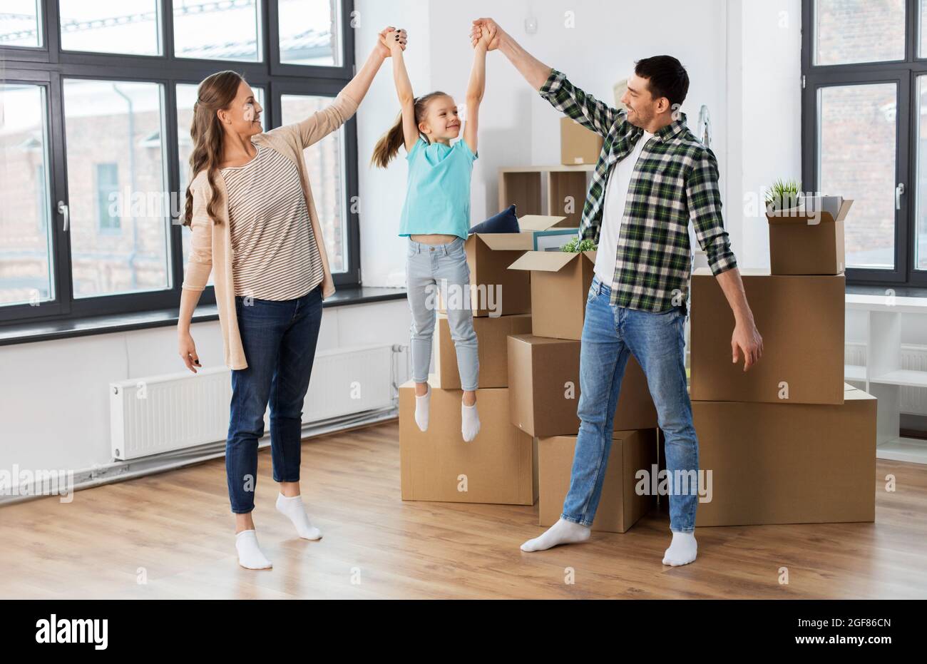 happy family with child moving to new home Stock Photo - Alamy