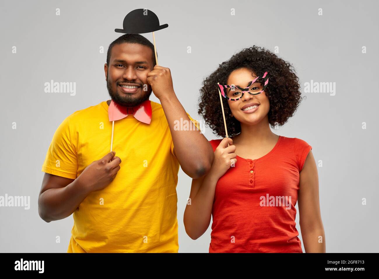 happy african american couple with party props Stock Photo - Alamy