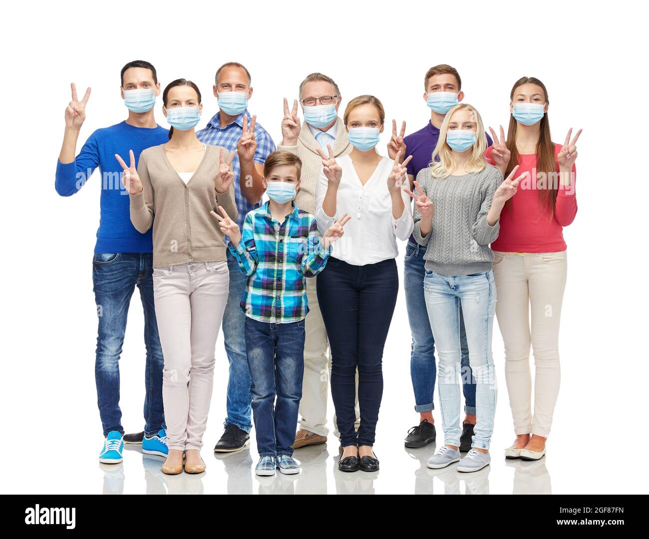 people in medical masks showing peace hand sign Stock Photo - Alamy