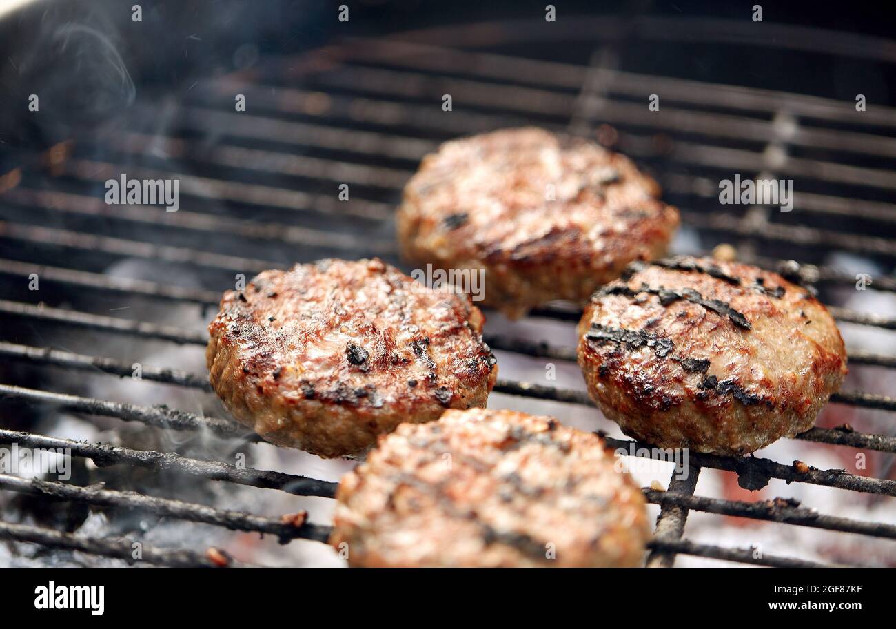 Meat fried on grill process hi-res stock photography and images - Alamy